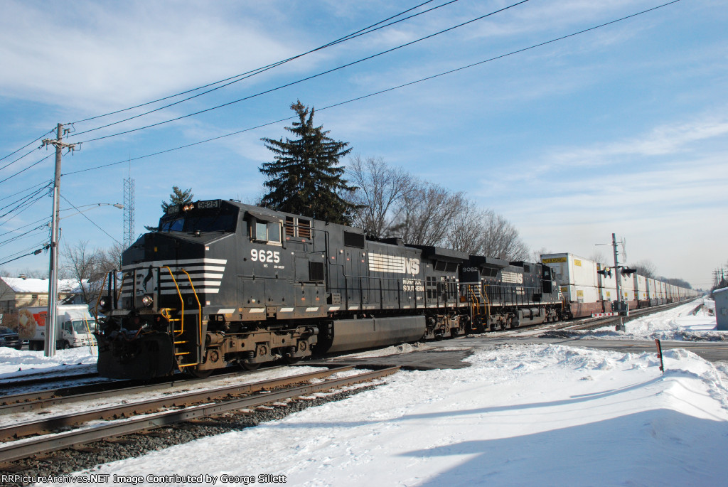 NS 9625 takes doublestacks west.